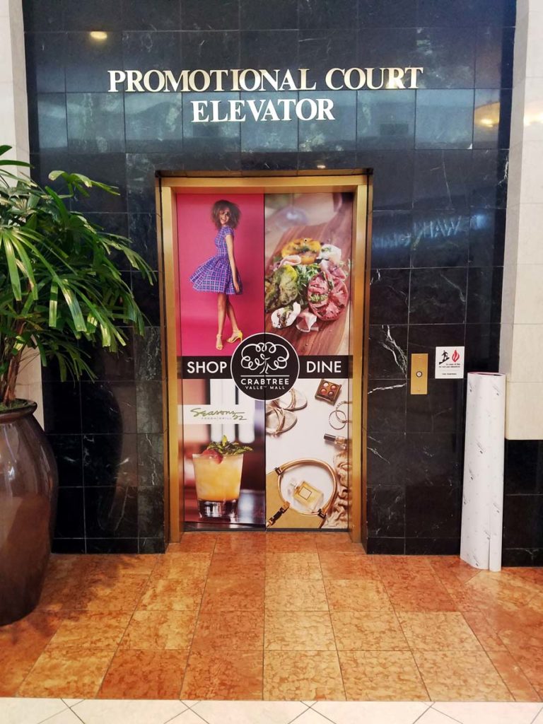Custom Elevator & Escalator Wraps in Raleigh | SpeedPro